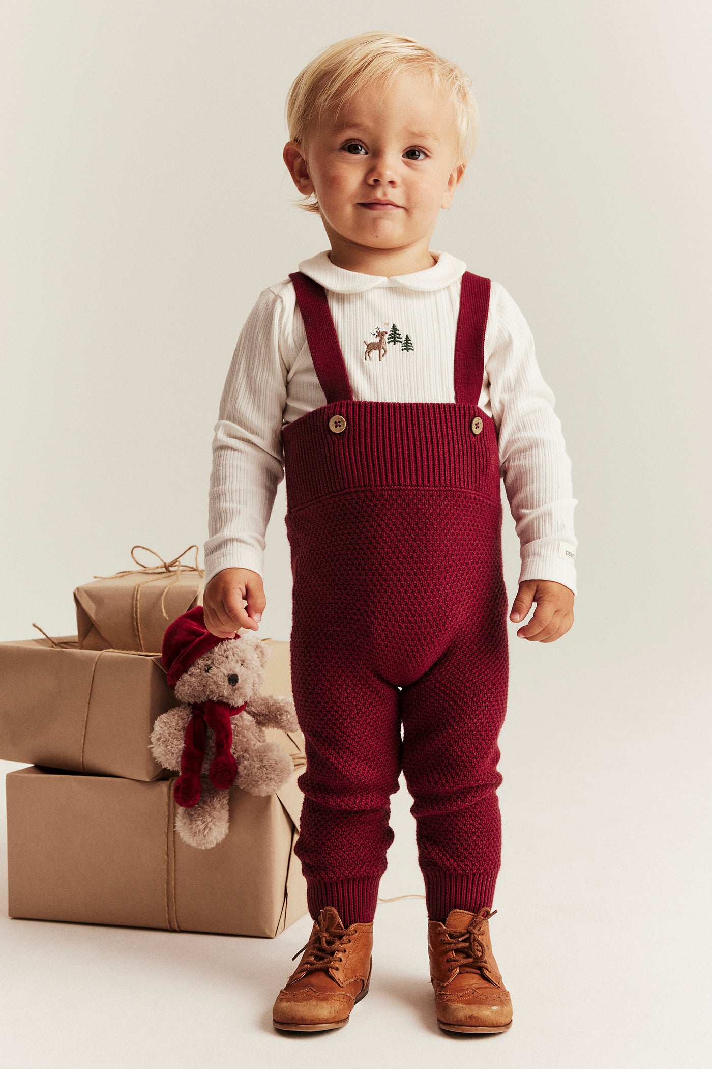 Baby red knitted dungarees – Newbie